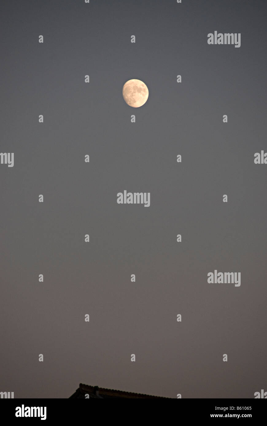 the moon over a residential street Stock Photo - Alamy