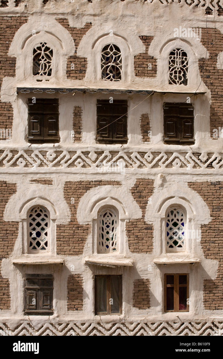 House made of brick clay, facade, ornaments, historic centre of San a ...