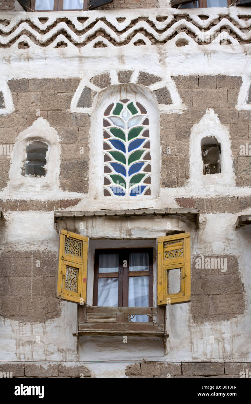 House made of brick clay, window, ornaments, historic centre of San a ...