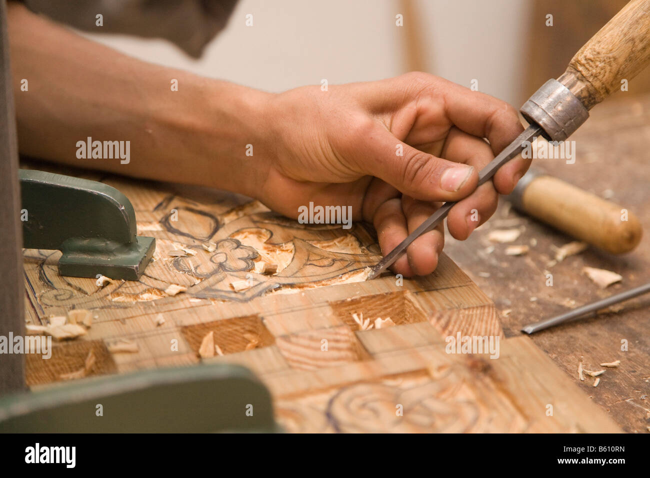 Man using tools, making bookends, national centre for handcrafts, San a ...