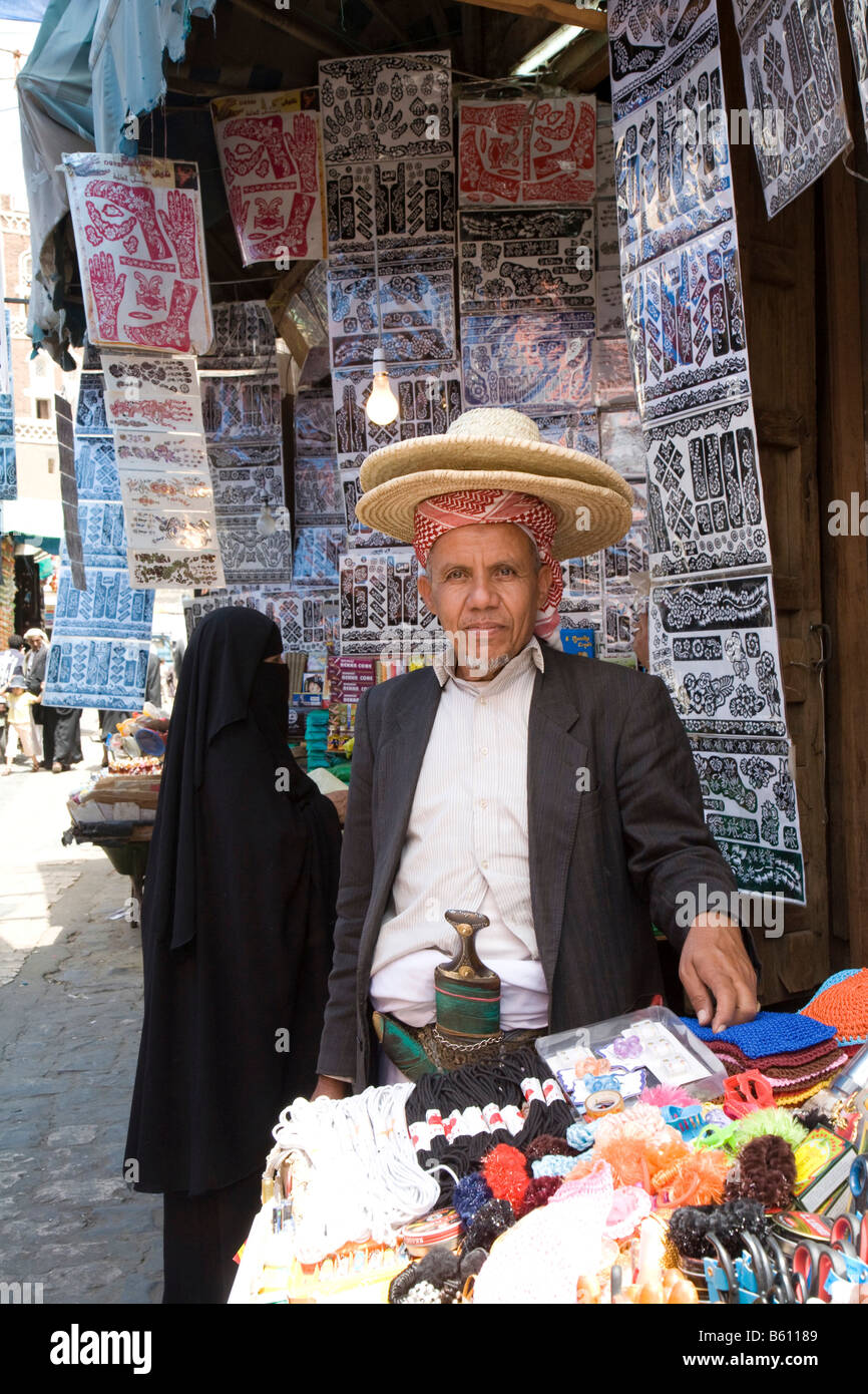 Man in front of a henna stall, souk, market, historic centre of San a ...