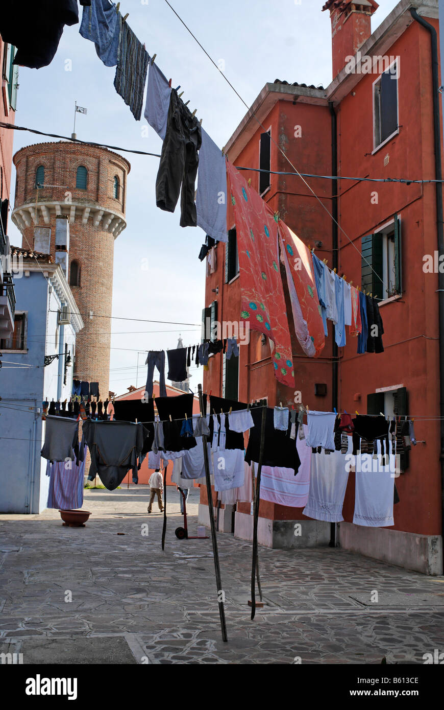 Washing lines hanging in front of houses on Burano, an island in the ...
