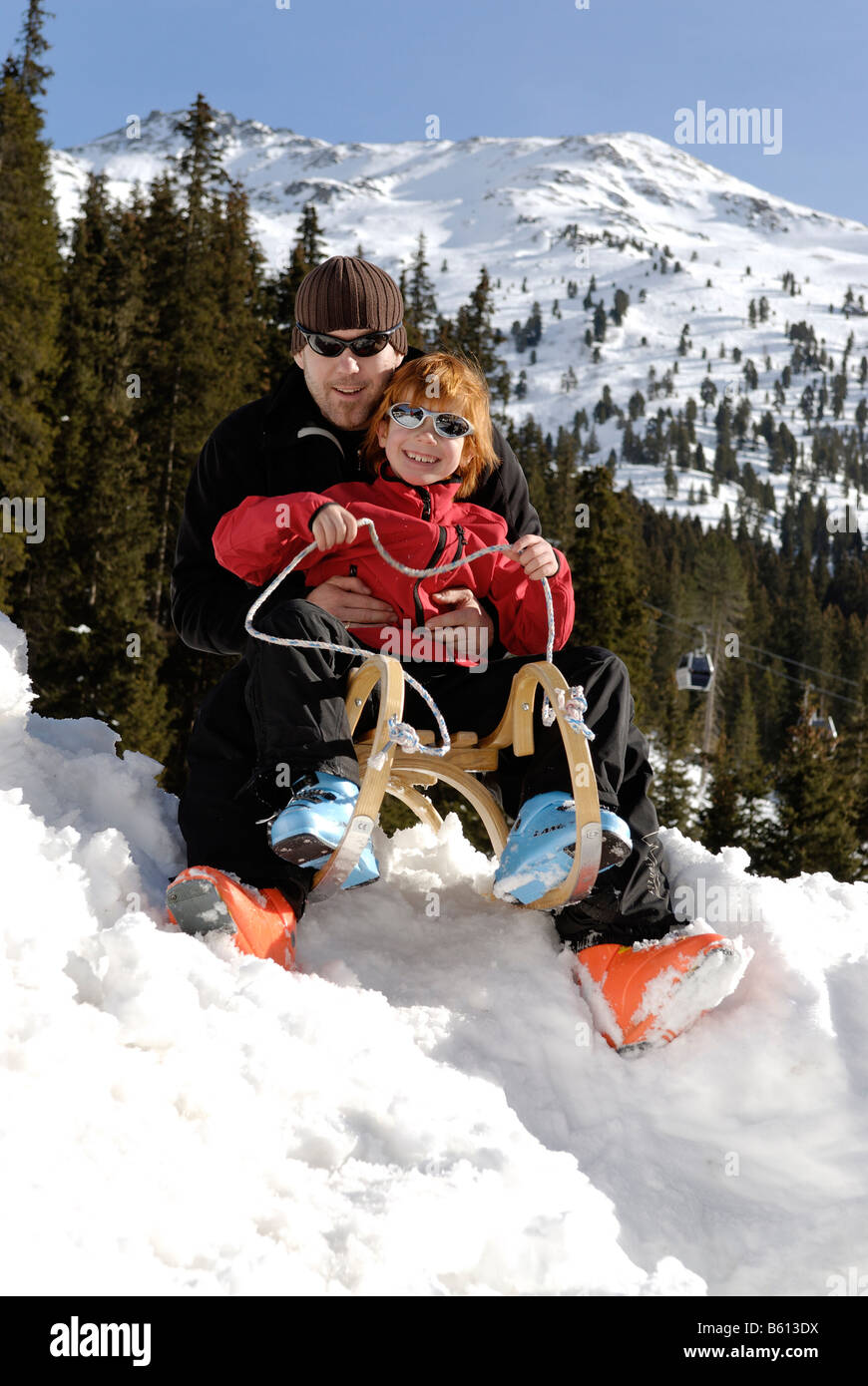 Children ride sledges hi-res stock photography and images - Alamy