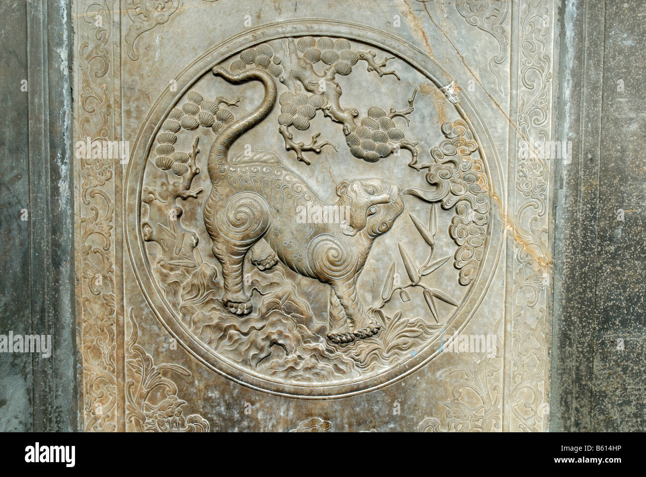 Stone carving of a Chinese tiger in a temple, Hoi An, UNESCO World ...