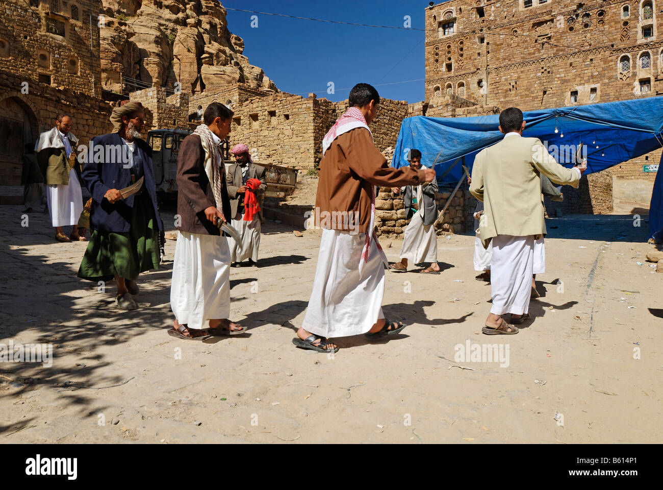 Men dancing a sword dance at a wedding in Thula, Yemen, Arabia, Arab ...