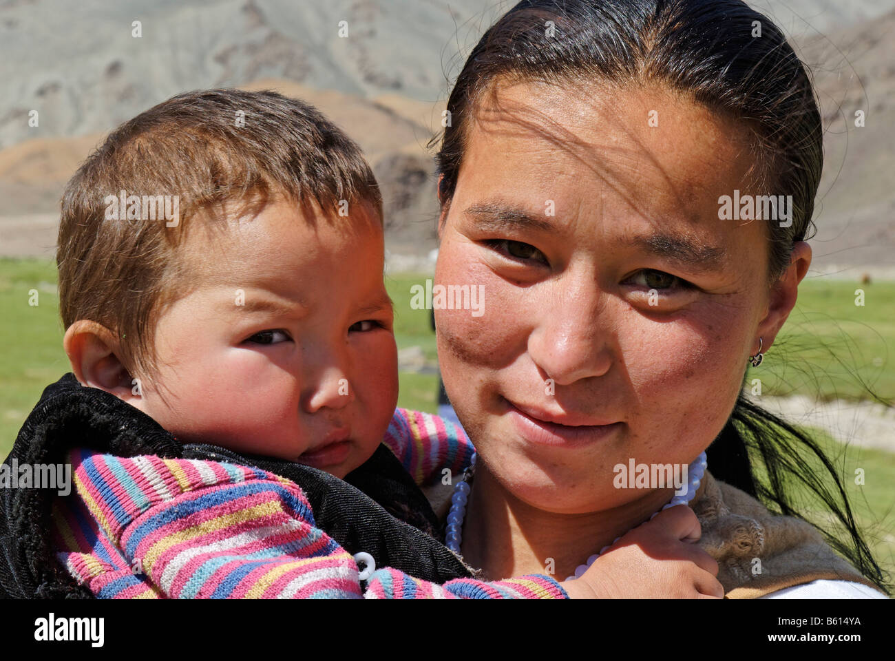 Kazakh, Mongolian woman with child, Kazakhstan, Mongolia, Asia Stock ...