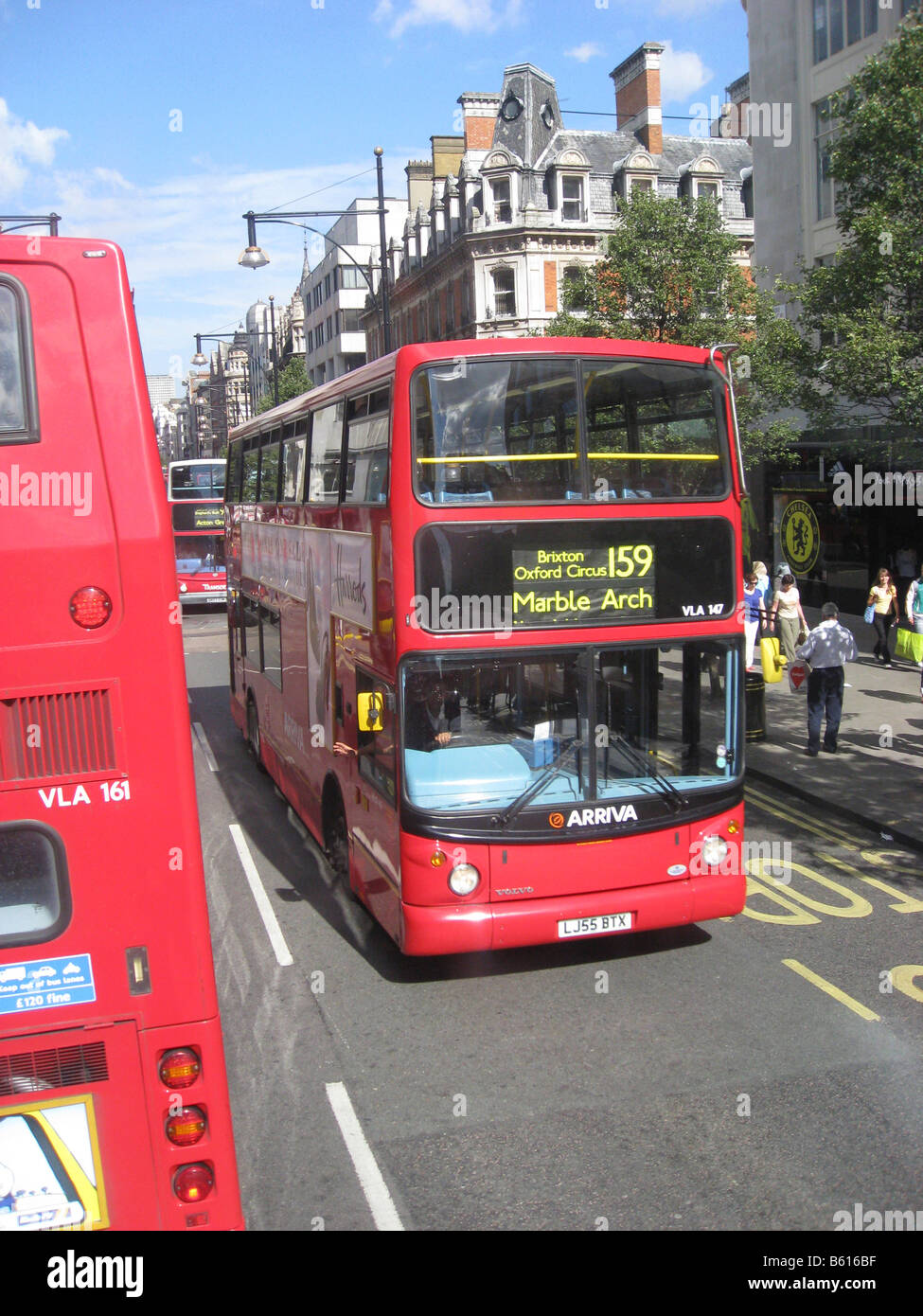 Red London buses in Oxford Street london GB UK Stock Photo - Alamy