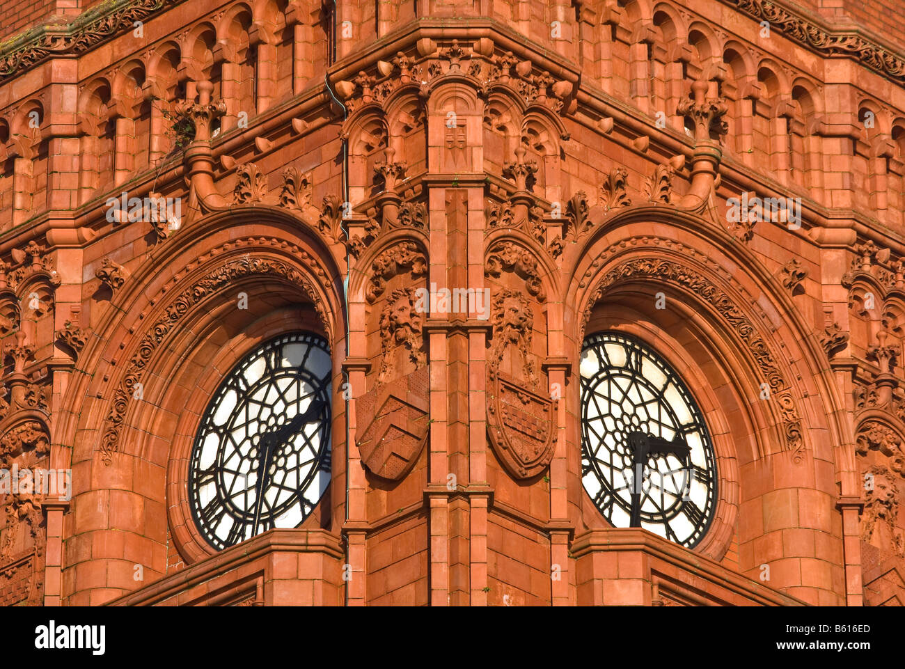 A close up shot of two clock faces on the clock tower of the Pierhead ...