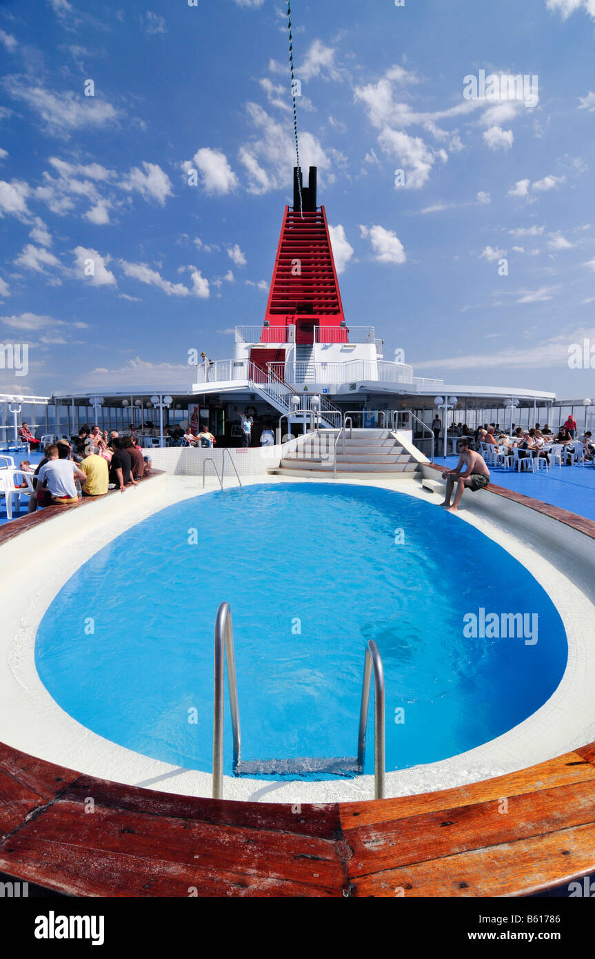 Swimming pool on the sun deck of a car ferry sailing between Italy and ...