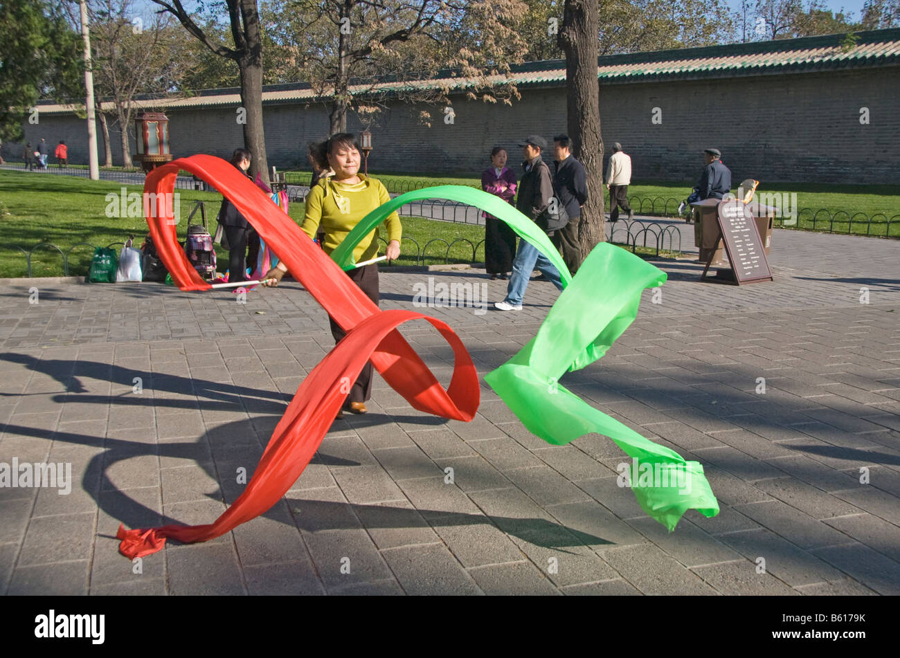 Woman practicing Ribbon Exercises in Temple of Heaven Park Beijing ...