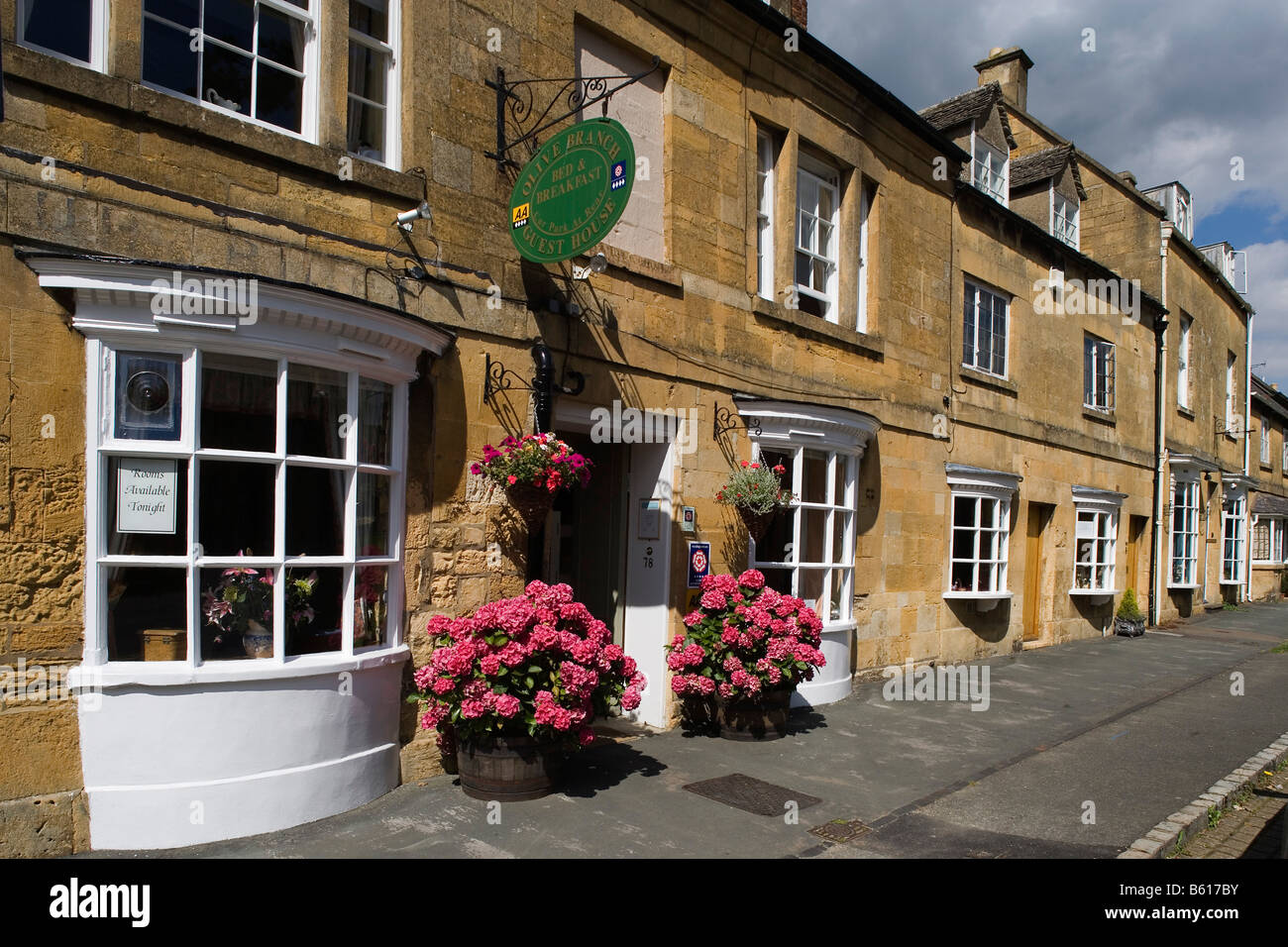 Broadway town center typical houses constructed in golden limestone ...