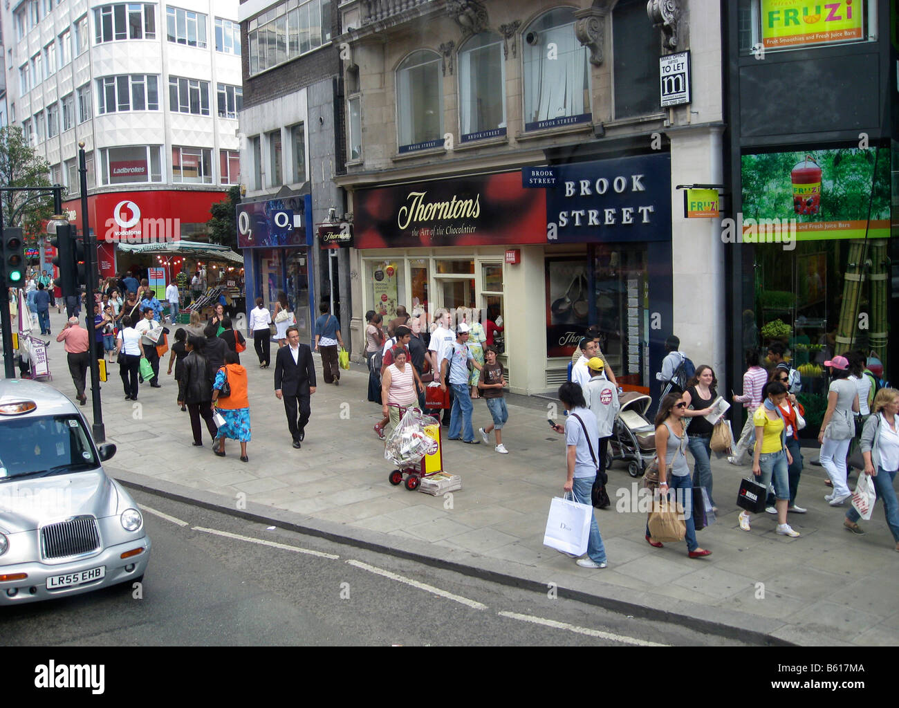 Oxford street shoppers hi-res stock photography and images - Alamy