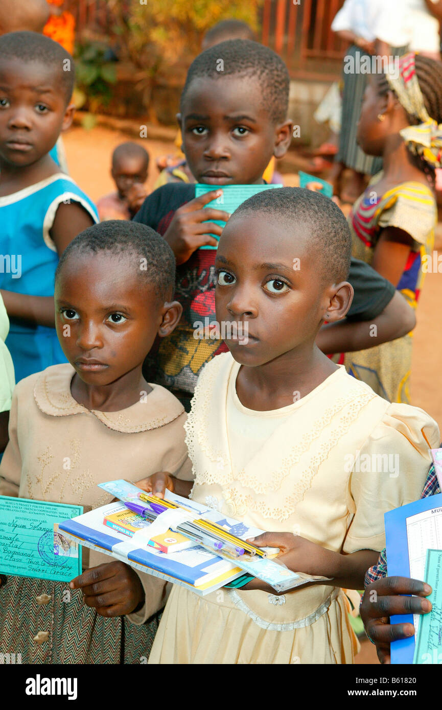Children receiving school materials, Women's Education Centre, Bamenda ...