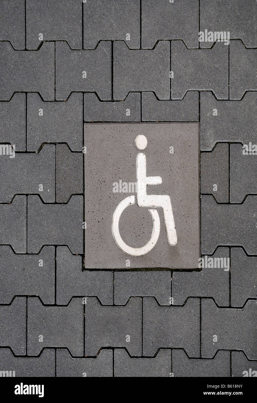 Disabled park place with wheelchair user pictogram in the paving Stock ...
