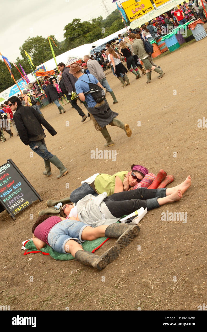 Glastonbury Festival tired exhausted fans sleeping in the middle of ...