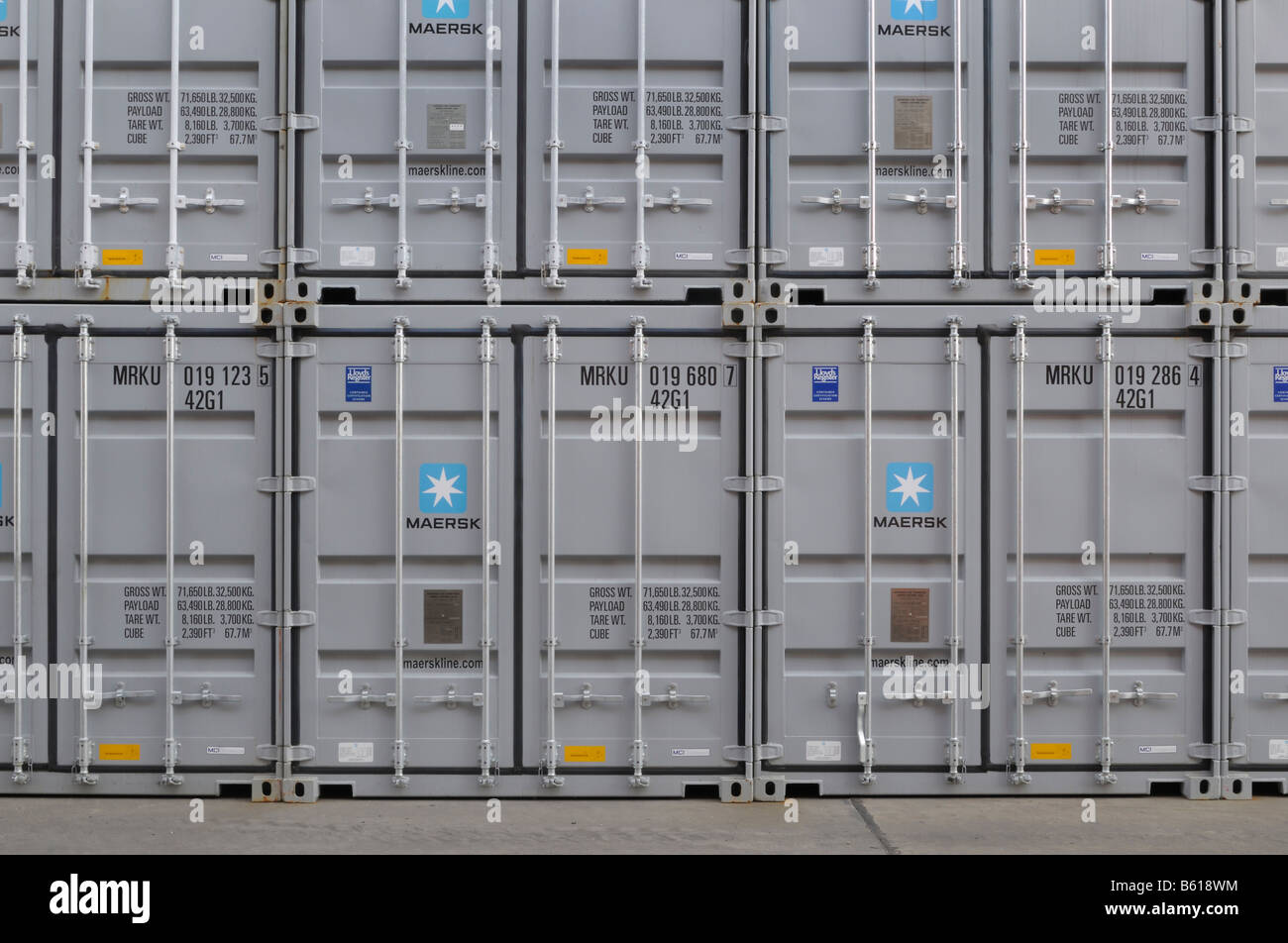 Stacked Maersk containers in a container terminal Stock Photo - Alamy