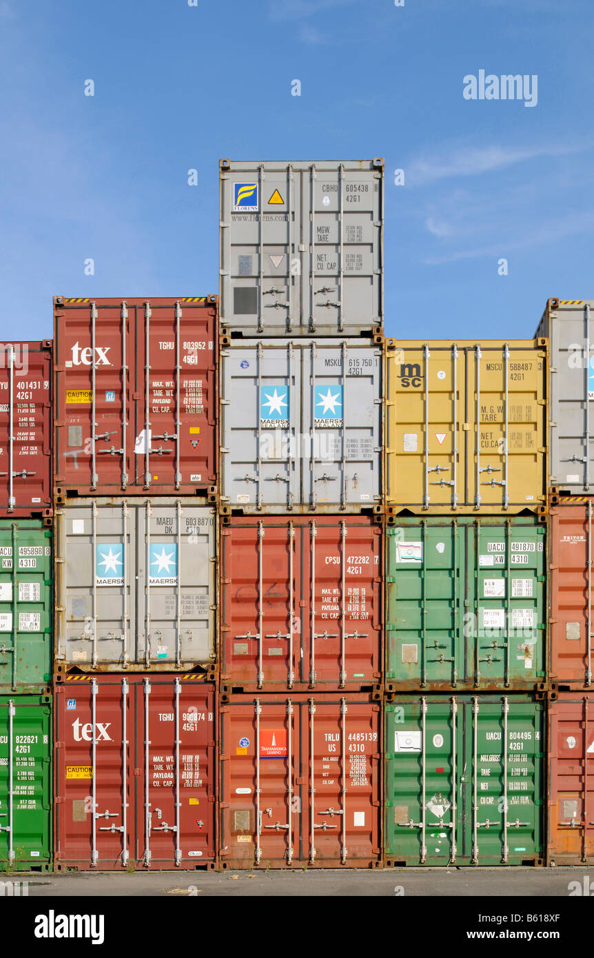 Stacked overseas containers of various sizes in a container terminal ...