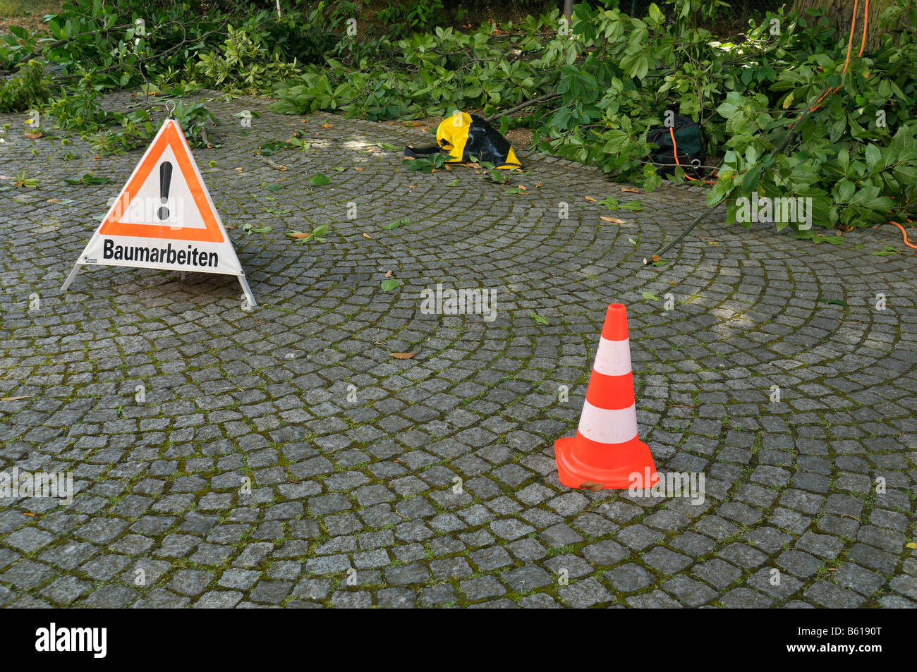 Tree-care work, safety sign on cobbles, sign for tree-work Stock Photo ...