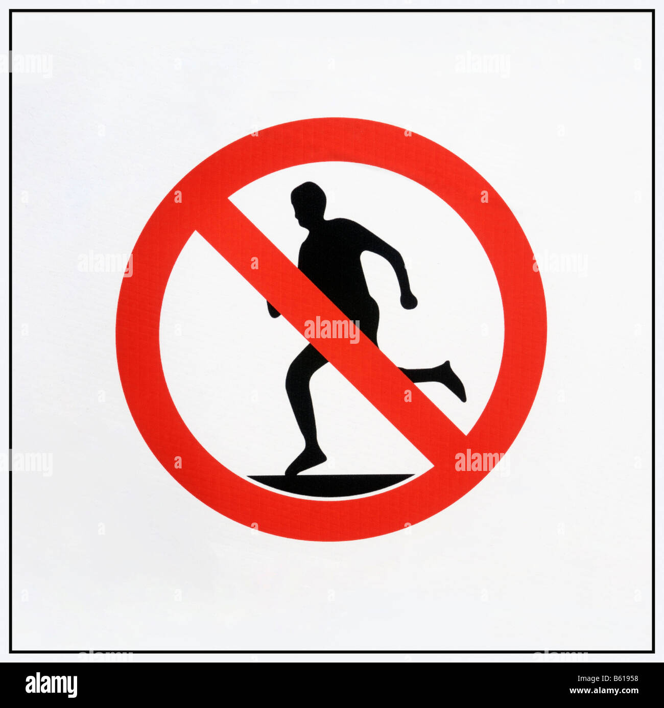Running forbidden, modified traffic sign Stock Photo - Alamy