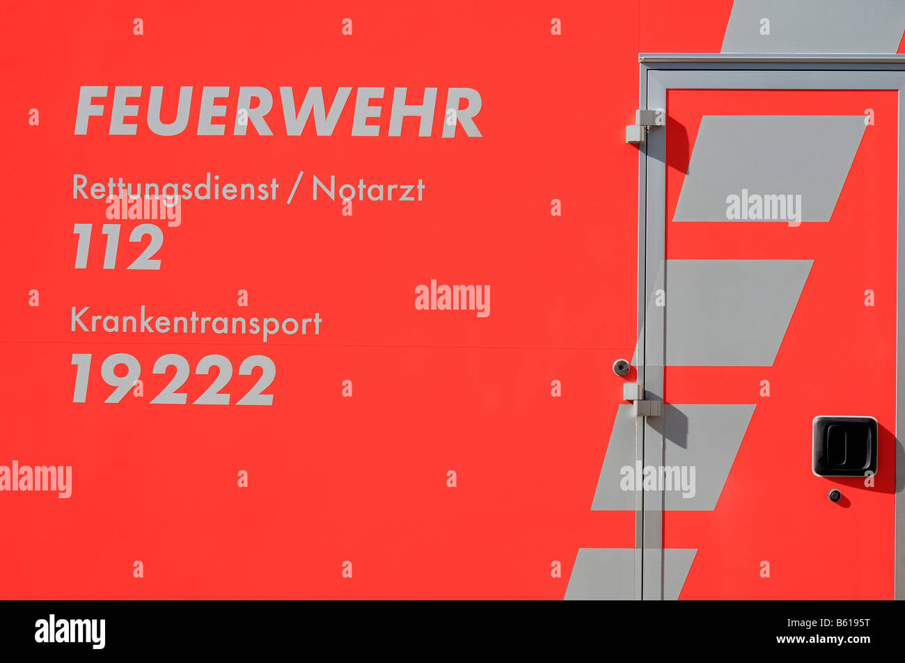 Lettering on a rescue vehicle: Fire brigade/emergency doctor 112 ...