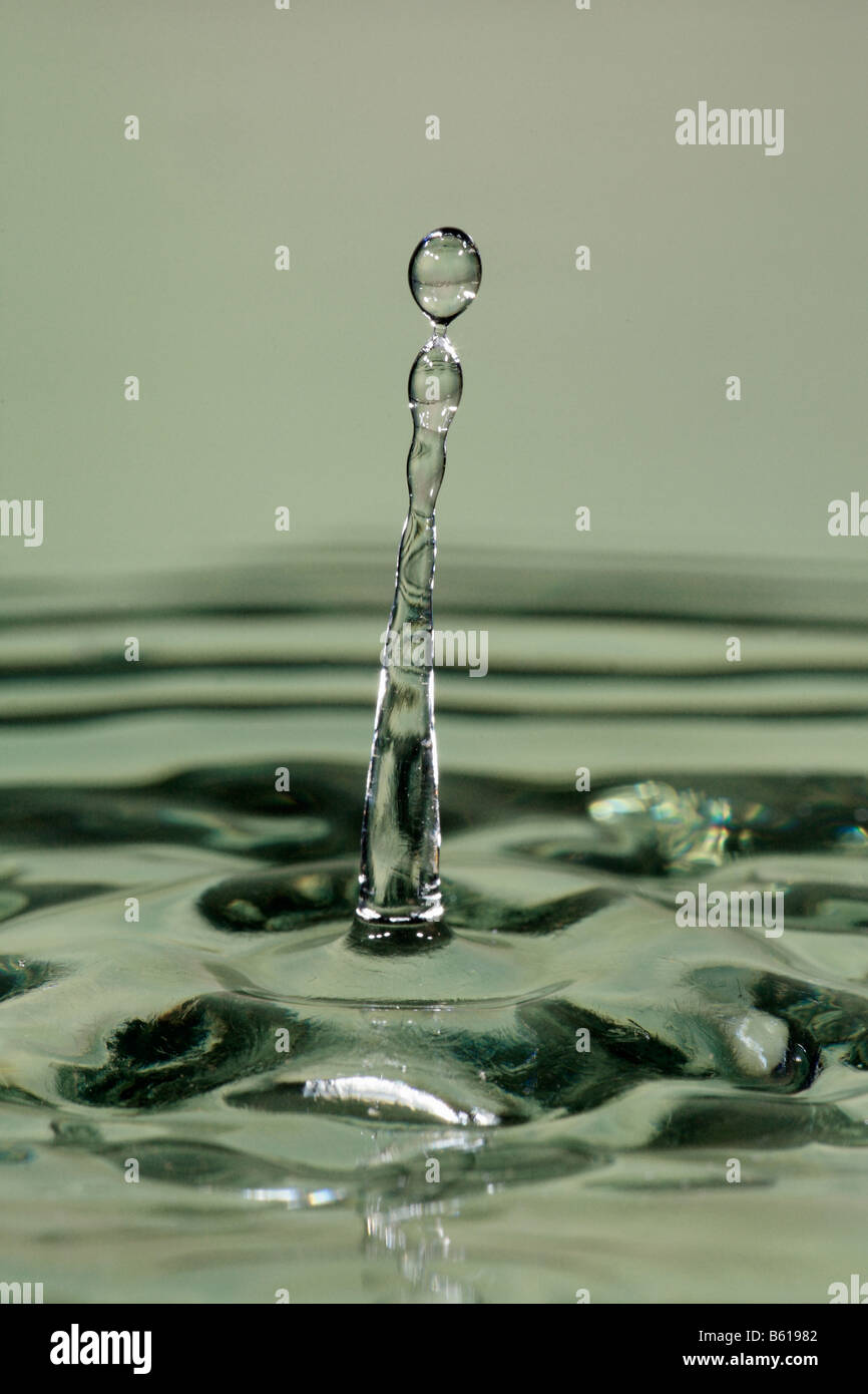 Water drop splashing down Stock Photo - Alamy