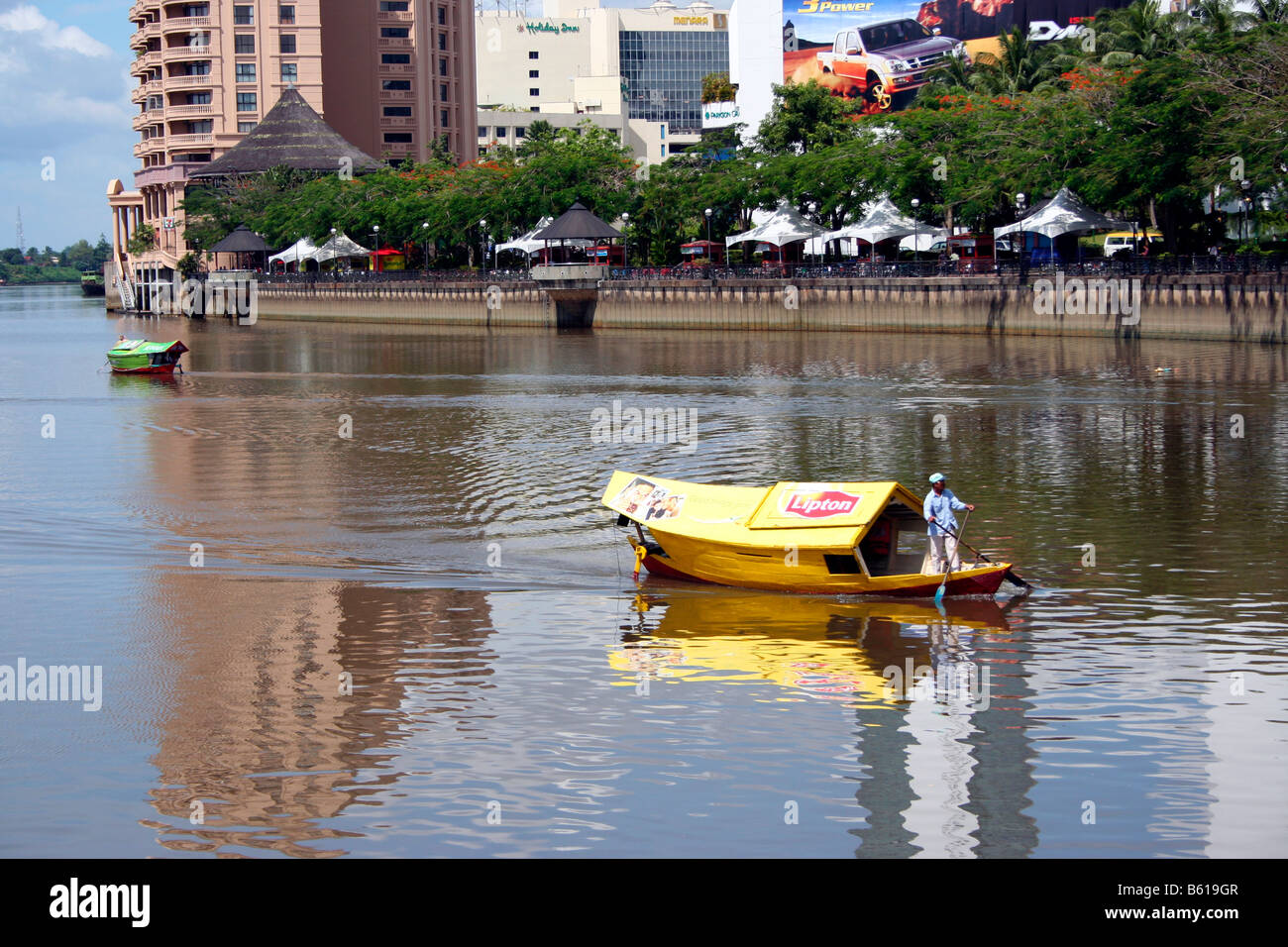 Row boat on Sarawak River in Kuching, East Malaysia Stock Photo - Alamy