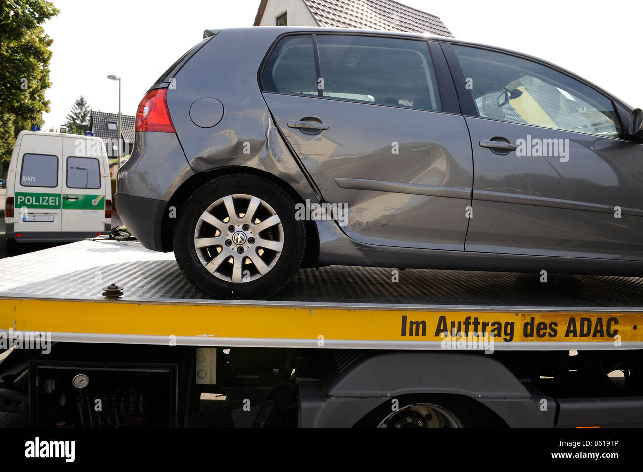 Accident damaged VW Golf mark V on an ADAC recovery vehicle Stock Photo ...
