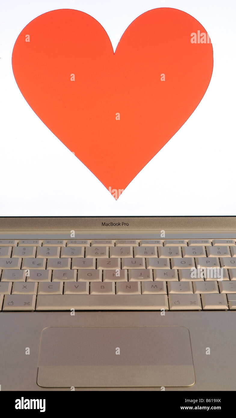 Heart on the keyboard, symbolic picture representing online partner ...