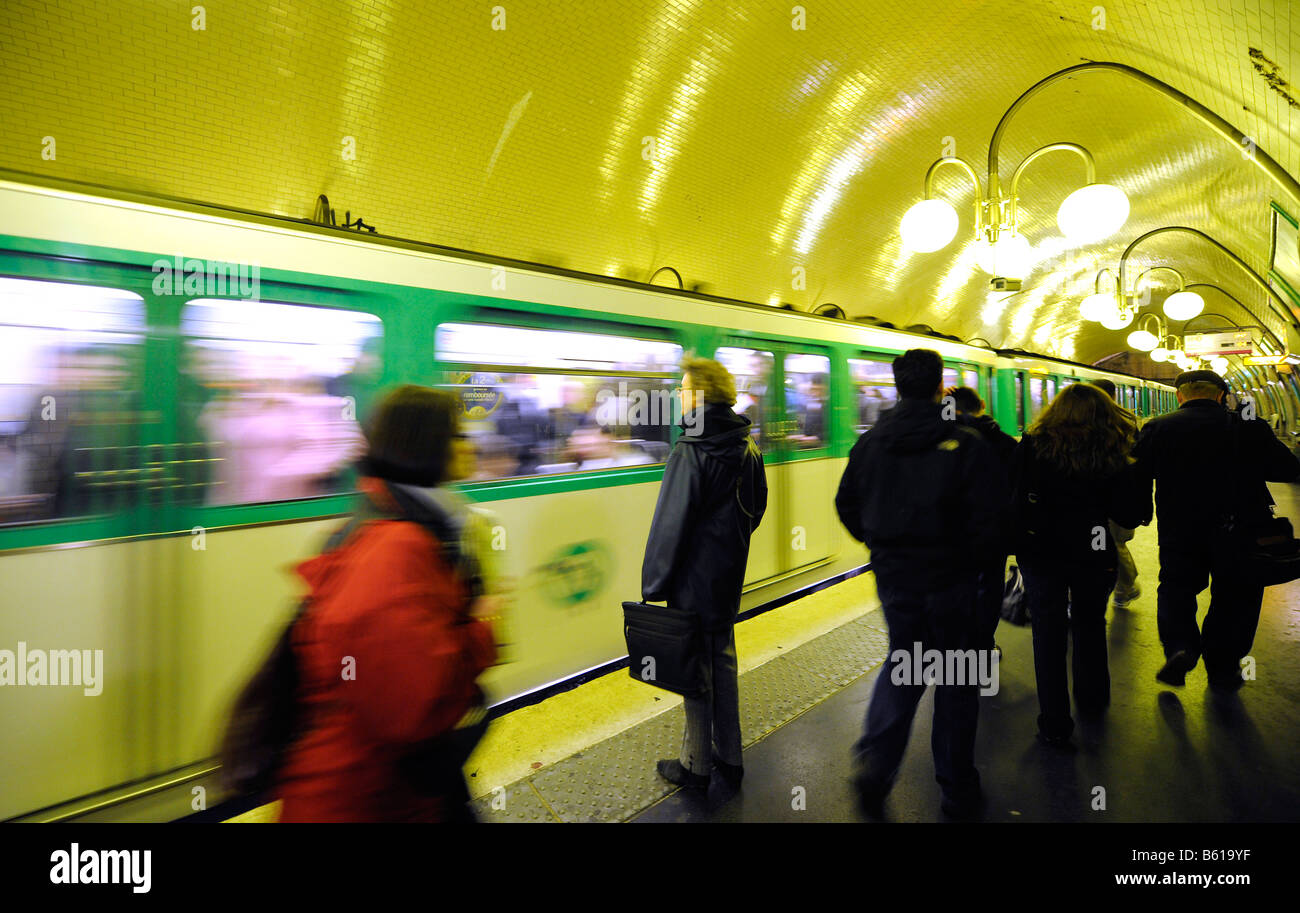Interior view of a metro station with travellers, Paris, France, Europe ...