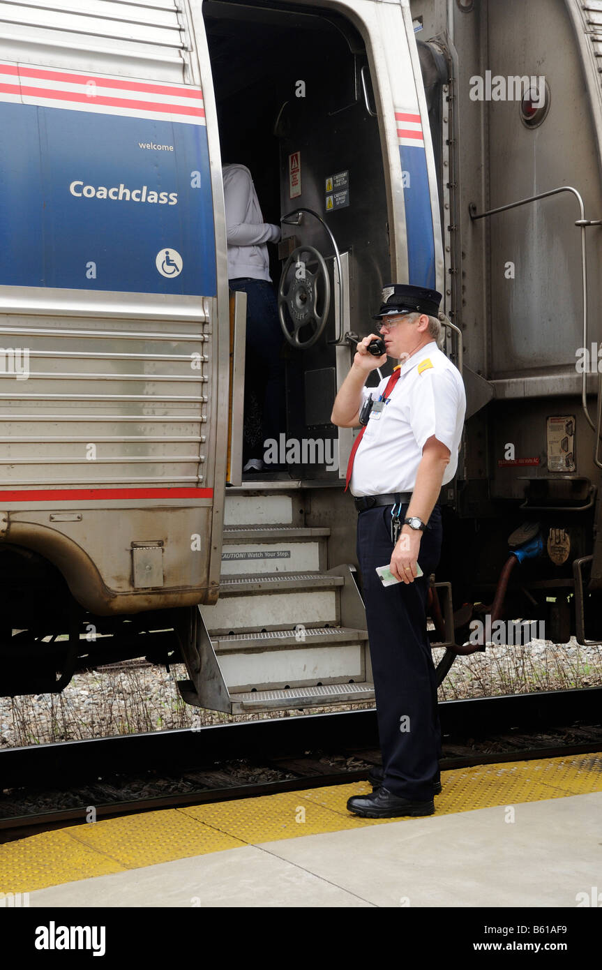 Amtrak railroad conductor communicating with train driver America USA ...