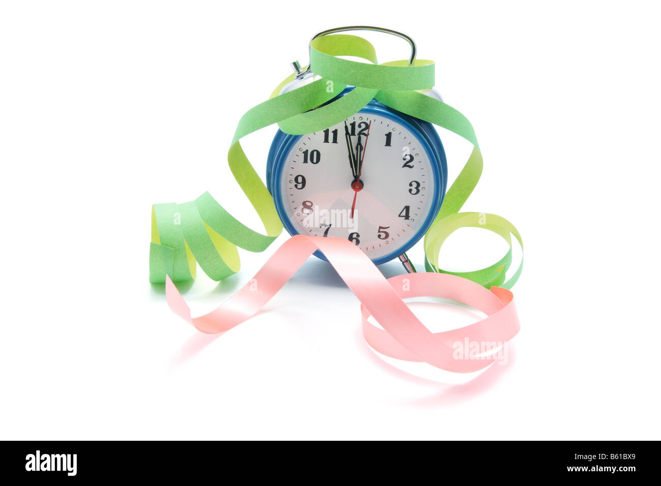 Alarm Clock and Curling Gift Ribbons Stock Photo - Alamy