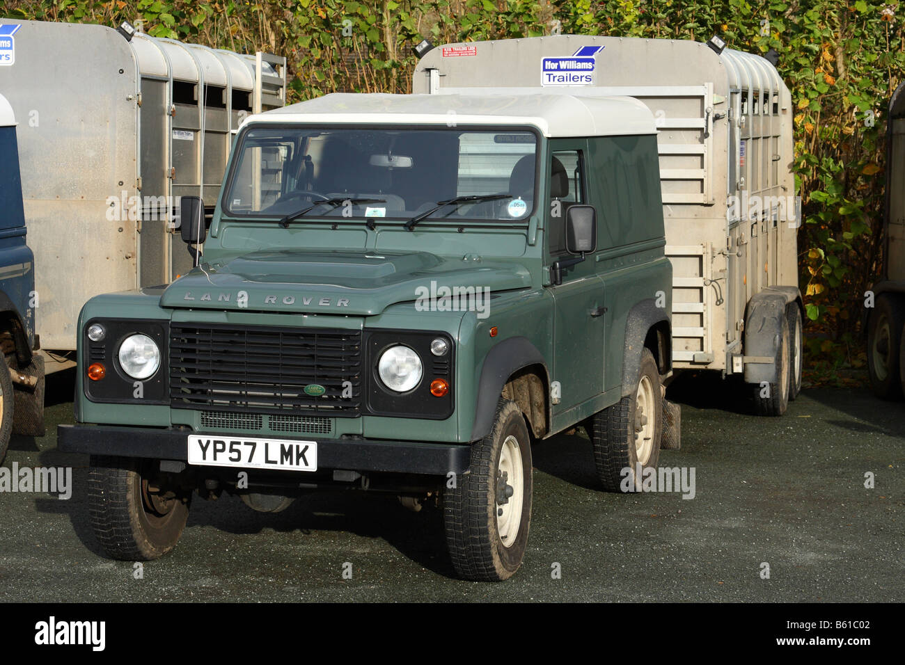 Land Rover Defender and trailer Stock Photo - Alamy
