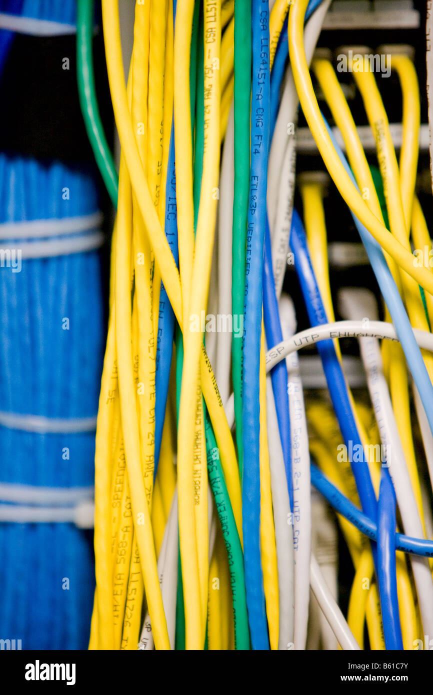 Closeup of various cables connected to a server Stock Photo - Alamy