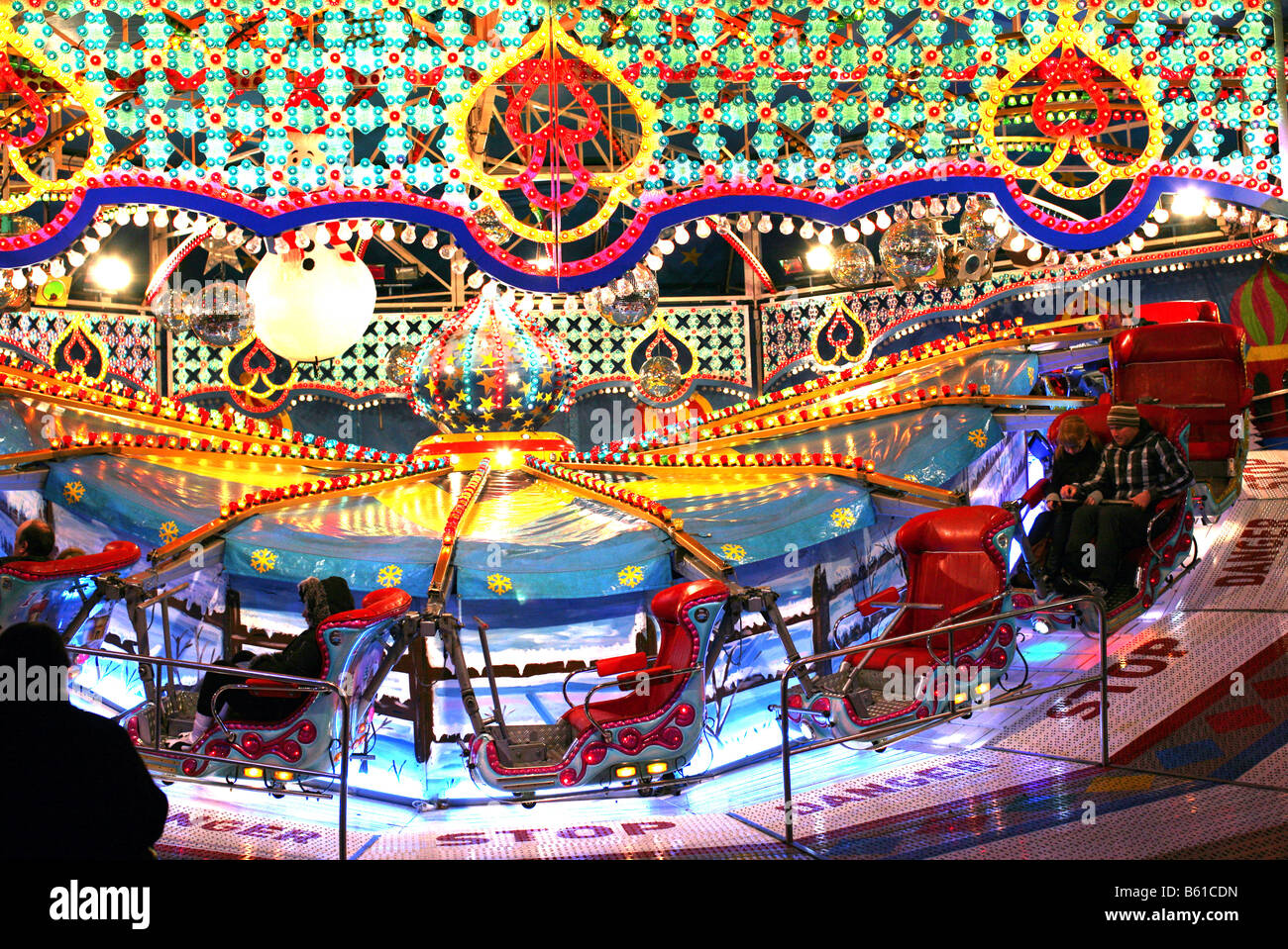 Funfair ride at London Christmas fair Stock Photo - Alamy