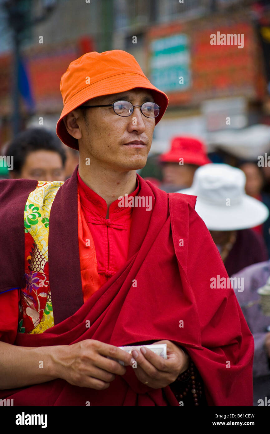 Monk holding money hi-res stock photography and images - Alamy