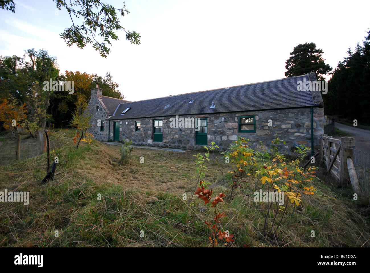 a newly renovated croft in the scottish highlands Stock Photo - Alamy
