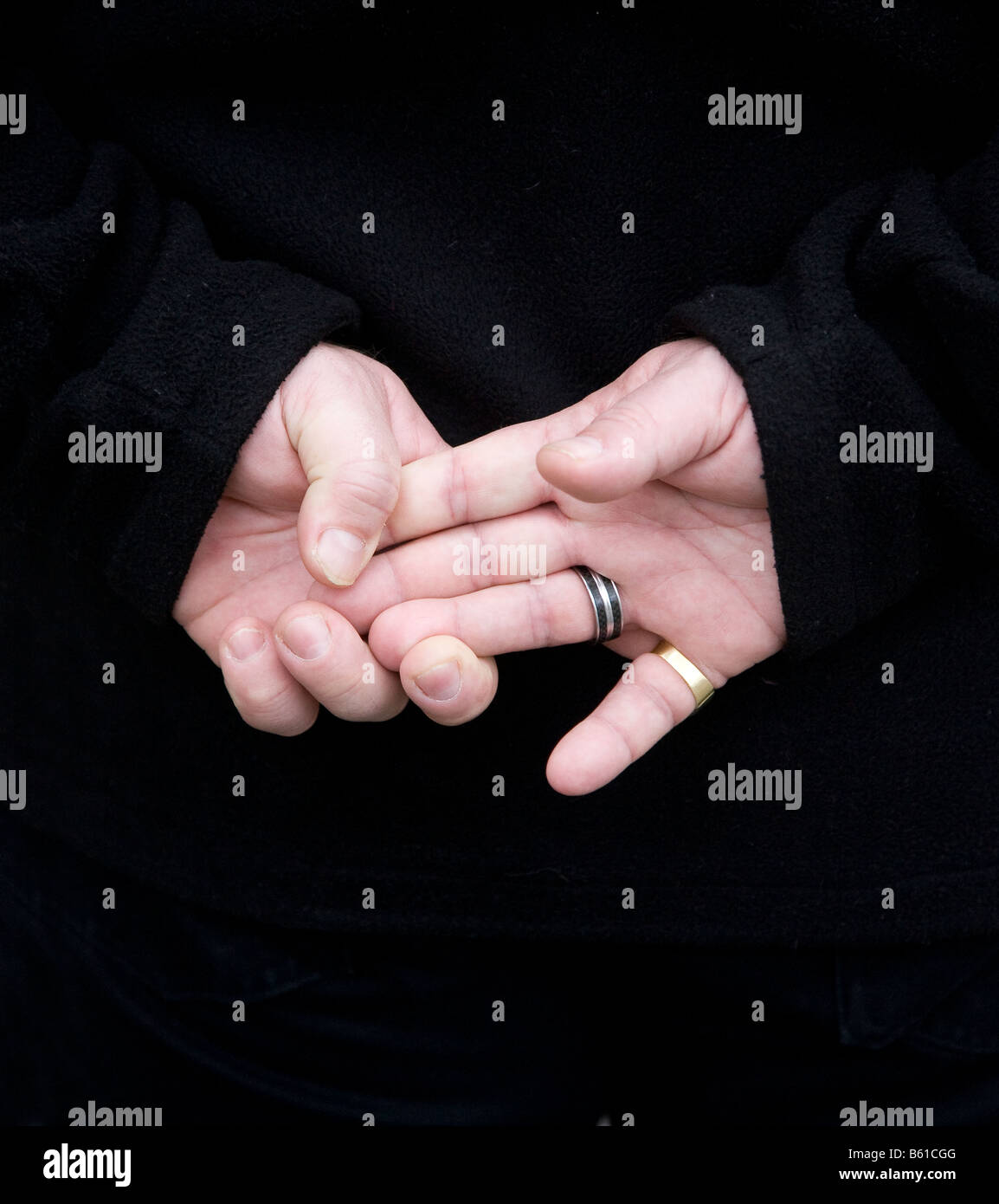 Clasp fingers hi-res stock photography and images - Alamy