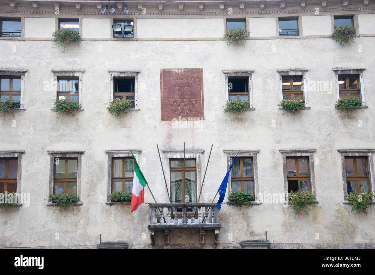 Italian flag and european flag at lake garda hi-res stock photography ...