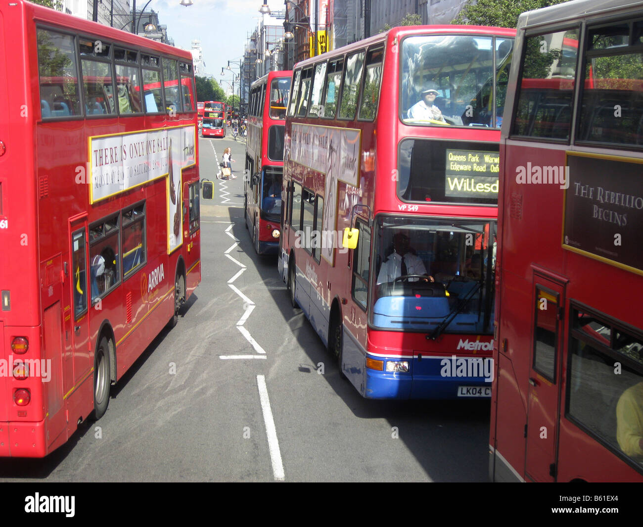 Four 4 red London Buses, Oxford Street, London GB UK Stock Photo - Alamy