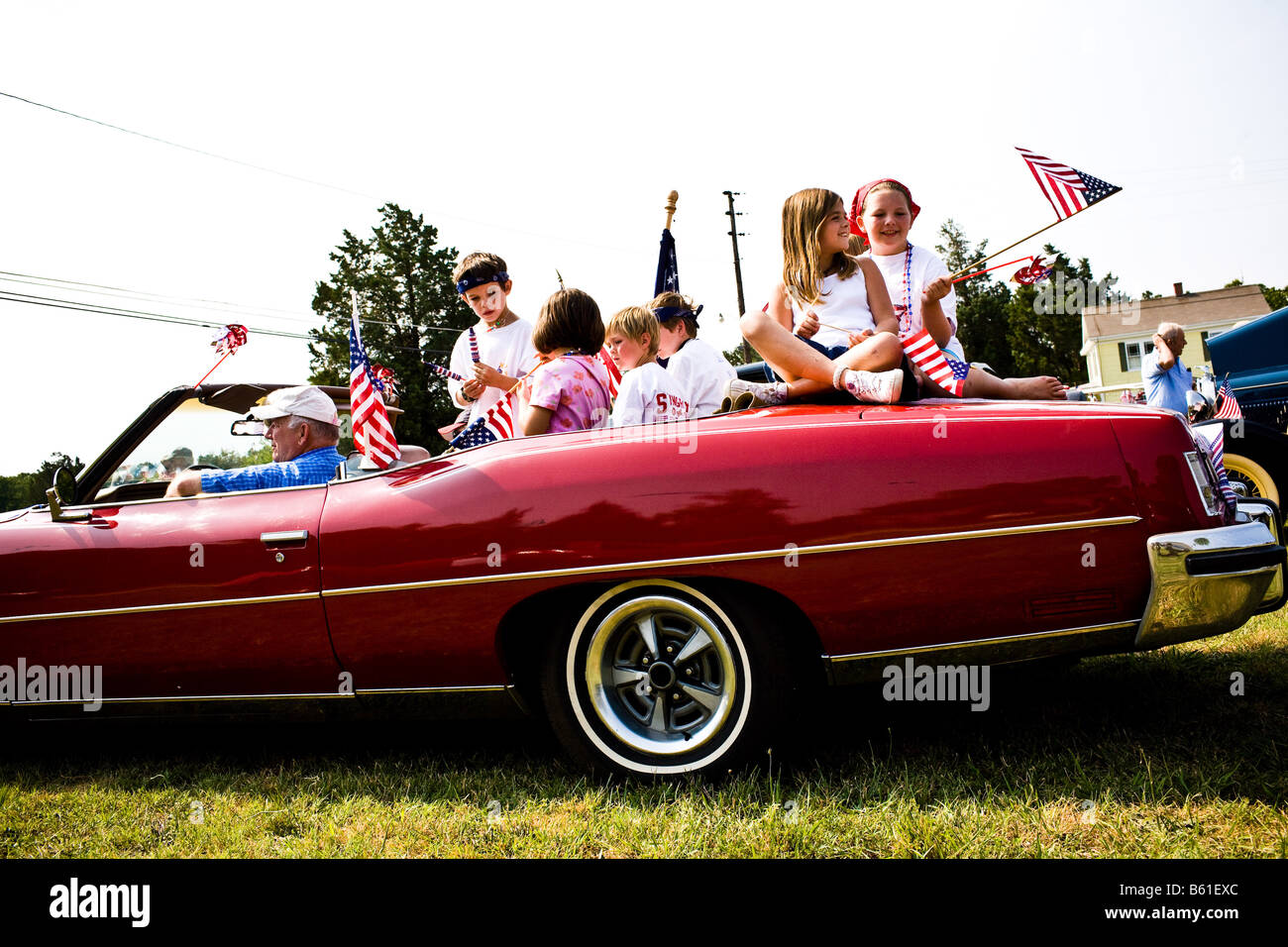 Classic cars line up before the 4th of July parade through Irvington ...
