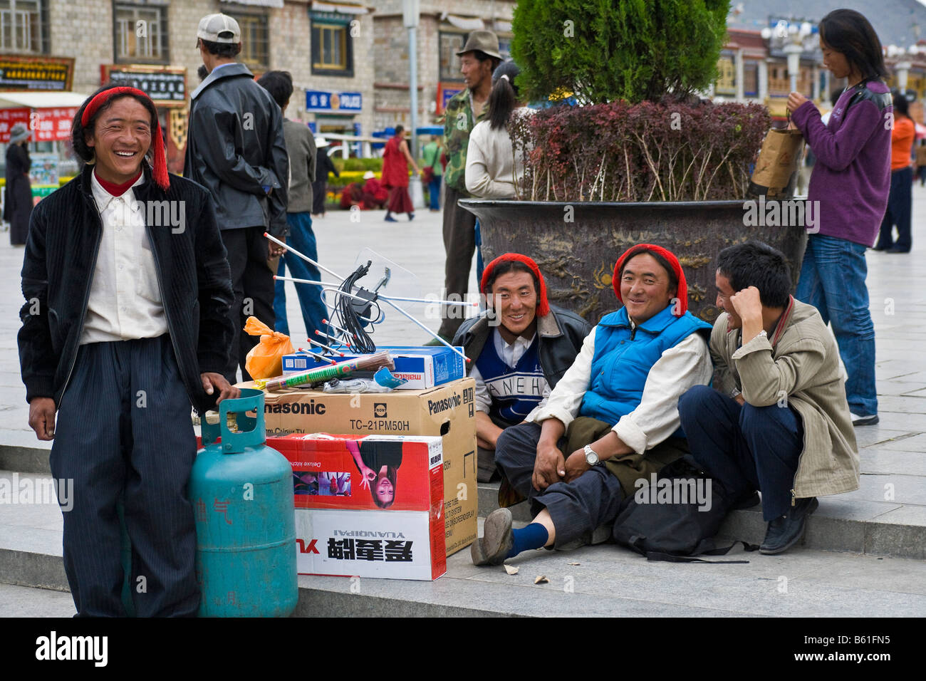 Smiling Khampas Tibetan men from the Kham region with new television ...