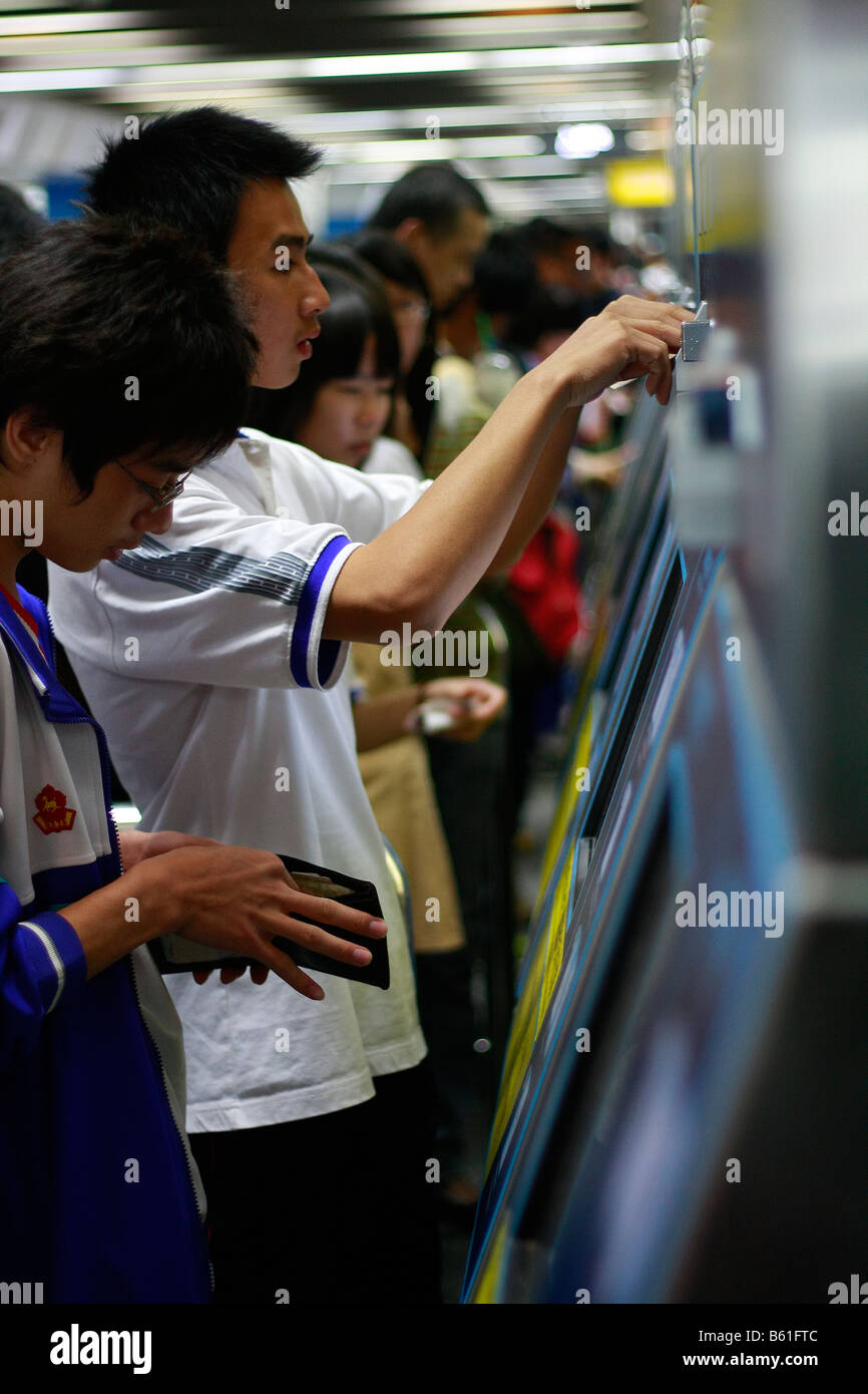 Chinese Commuters buying subway ticket in Guangzhou China Stock Photo ...