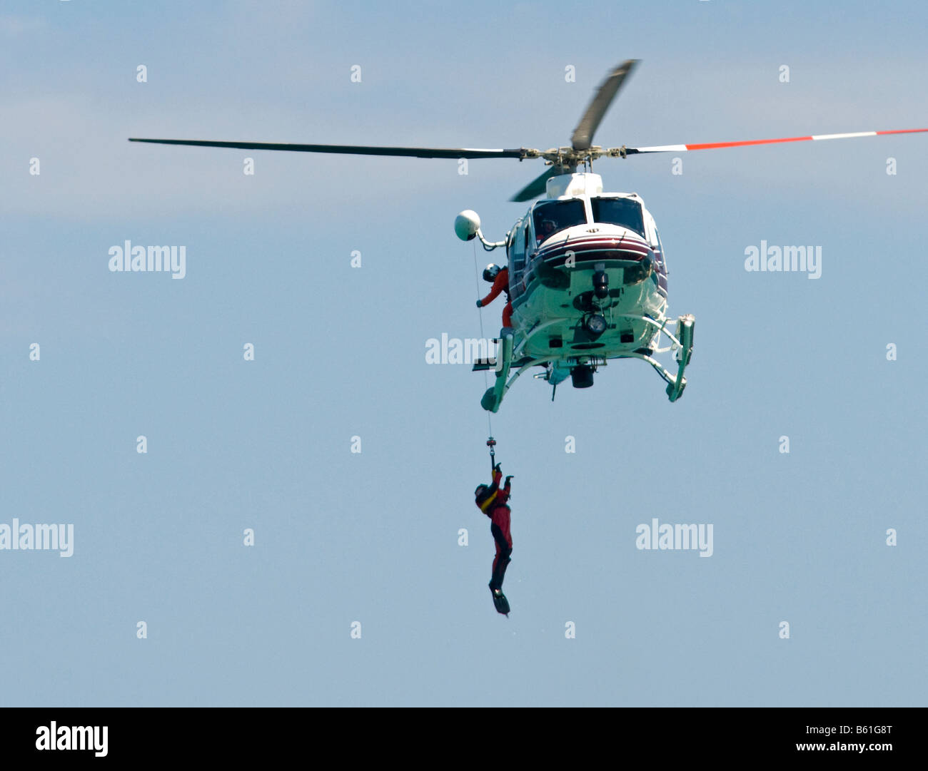 Rescue Helicopter lifting rescue swimmer - Bell 205/Huey - Chicago Fire ...
