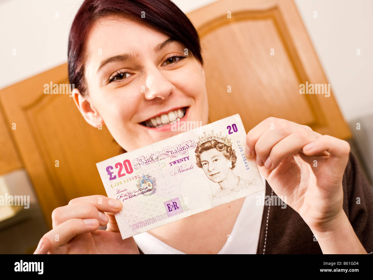 Woman british money hi-res stock photography and images - Alamy
