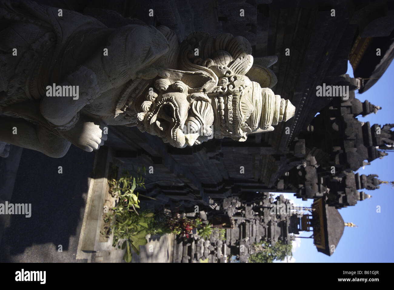 Balinese statue at Goa Lawah (bat cave) temple Stock Photo - Alamy