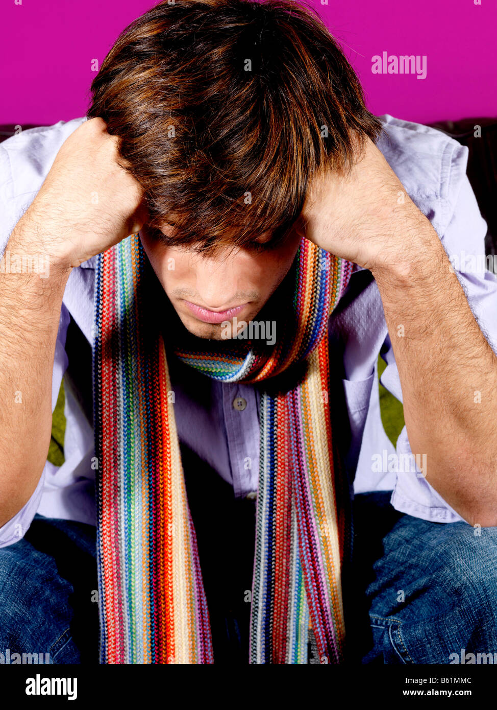Bored Young Man Wearing A Neck Scarf Model Released Stock Photo - Alamy