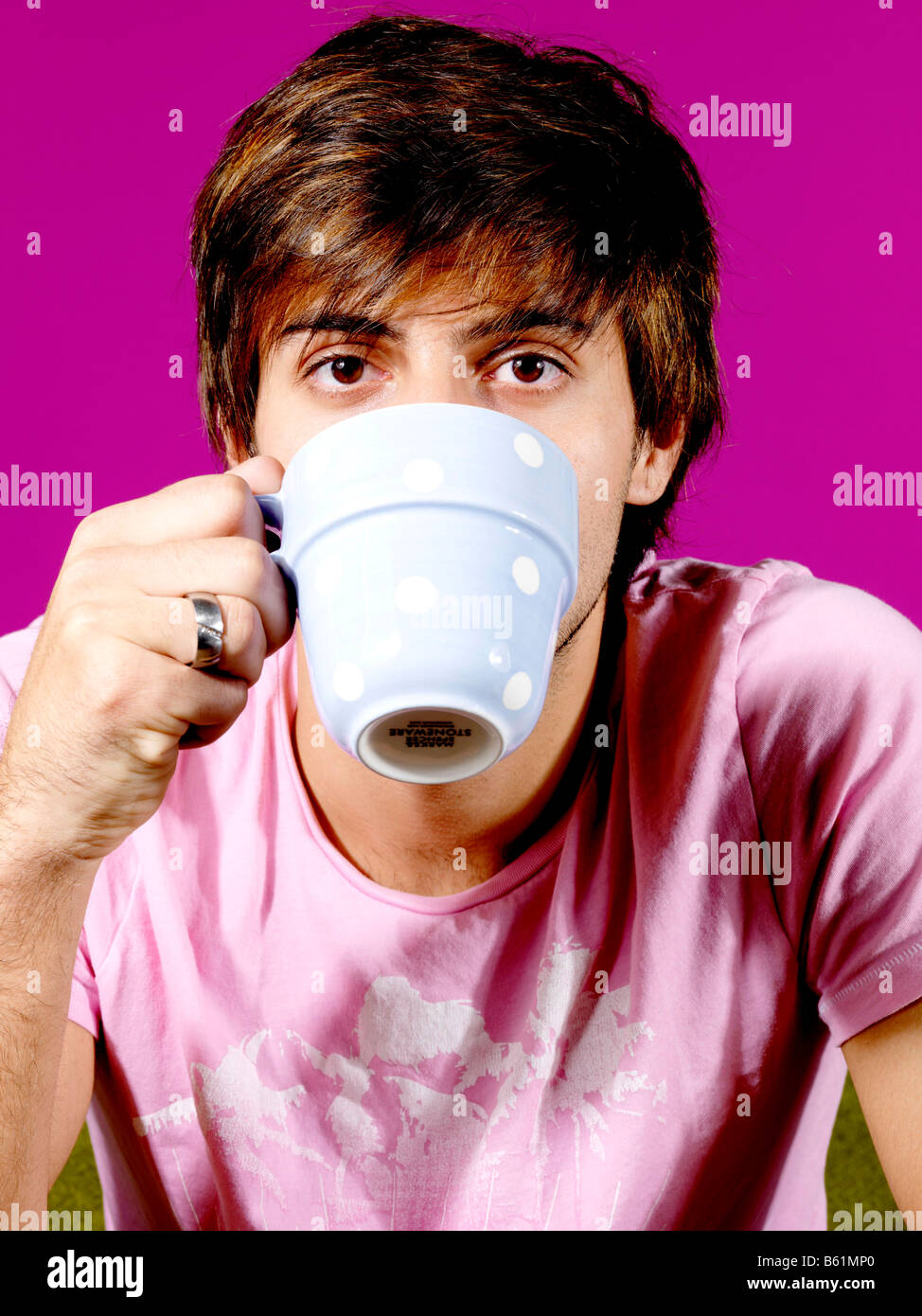 Young Man Drinking Coffee Model Released Stock Photo - Alamy