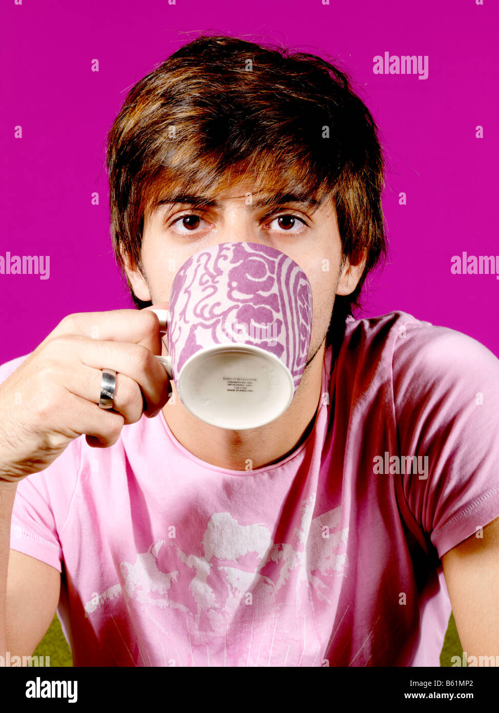 Young Man Drinking Coffee Model Released Stock Photo - Alamy