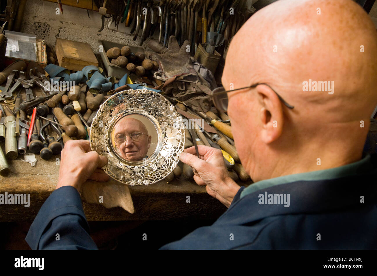 Silversmith Robert Lamb at his workshop in Sheffield Stock Photo - Alamy