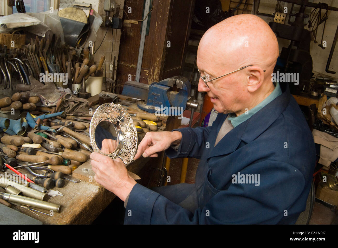Silversmith Robert Lamb at his workshop in Sheffield Stock Photo - Alamy
